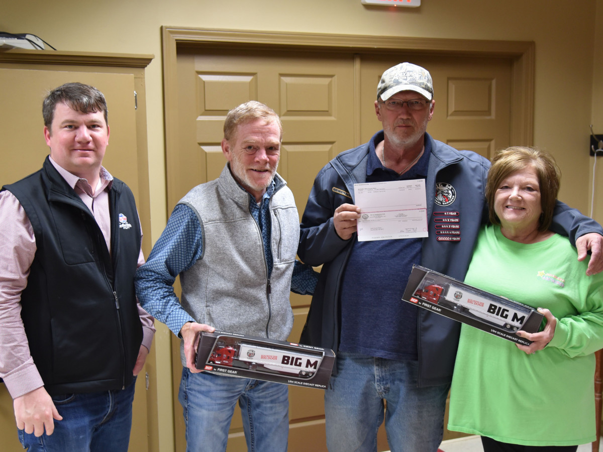 Big M Transportation - Employees Donate to Christmas Cause